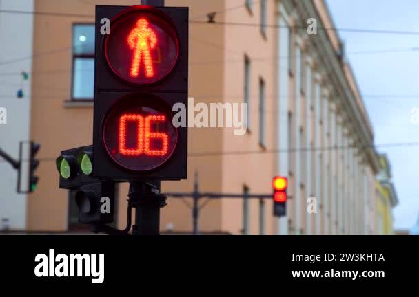 City traffic light turns from red to green. Changes from red to green ...