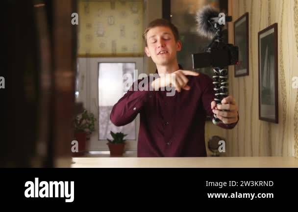 Famous young influencer excited while talking with the camera ...