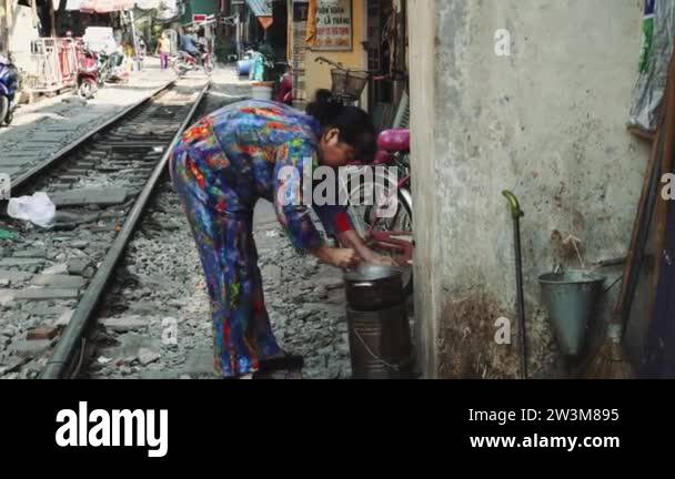 Hanoi, Vietnam. Hanoi Train Street through slums 4K Stock Video Footage ...