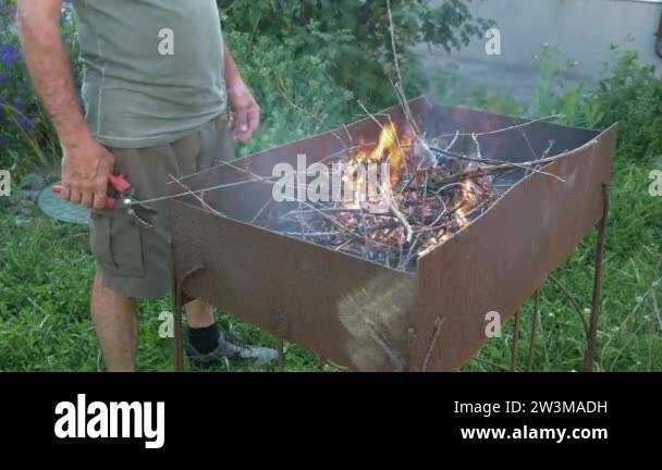 Bonfire burning trees. Barbecue grill flame Fire. Man makes fire flames ...