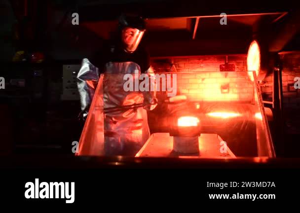 PERTH, WA - NOV 10 2019:Gold ingot casting in Perth Mint.Built in 1899 ...