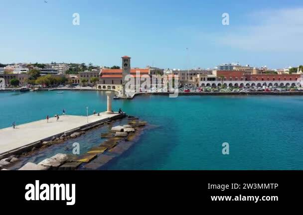 Mandraki port with deers statue, where The Colossus was standing and ...