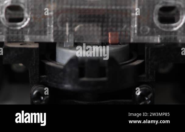 Tape recorder head and roller assembly. Close-up of a reel for a drum ...