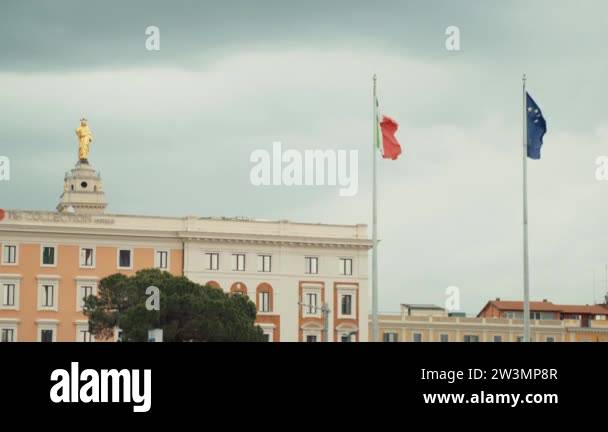 ROME, ITALY - JULY 3, 2020: European Union and italian flags blowing in ...