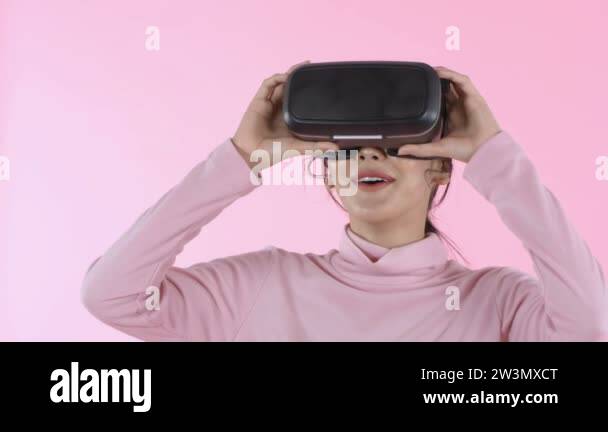 Beauty concept. Smile young woman wearing using virtual reality VR ...