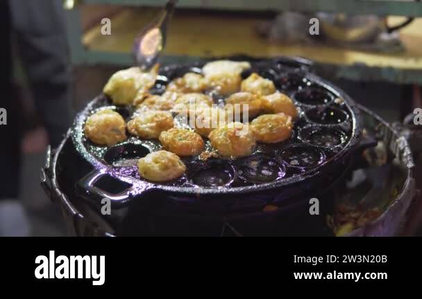 Footage B Roll of Thai style Takoyaki traditional coconut pancakes ...