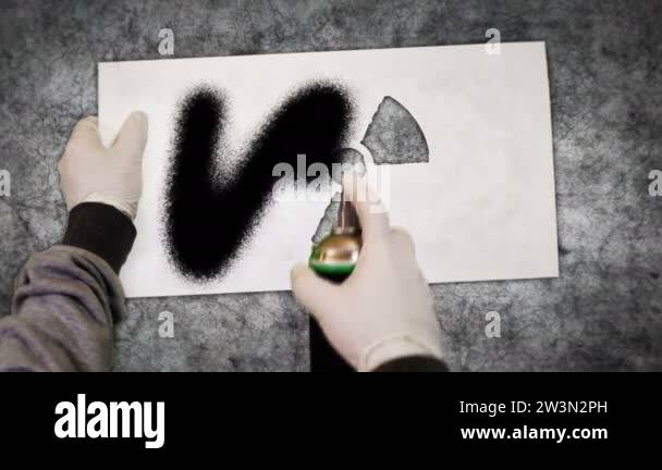Radiation and nuclear energy warning symbol spray painted on the ...