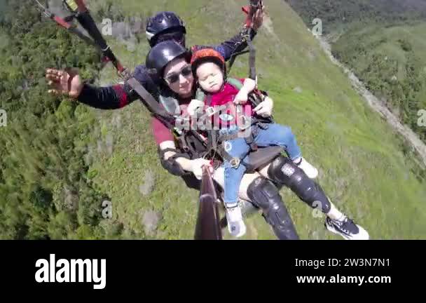RANAU,SABAH,MALAYSIA- JANUARY 20,2020 : Tourist mother and son fly ...