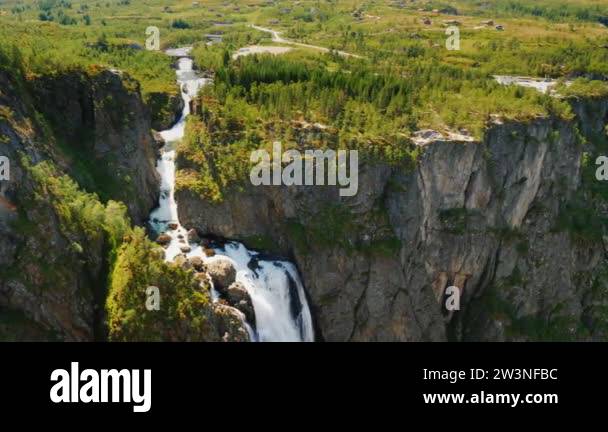 Tilt dawn shot: The famous waterfall Voringsfossen in Norway ...