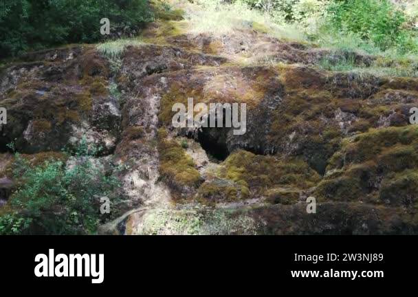 Waterfall at City Rauna, Latvia. River With a Rocky Bottom and Rauna ...