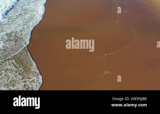 Tropical beach aerial view, Top view of waves break on tropical yellow ...