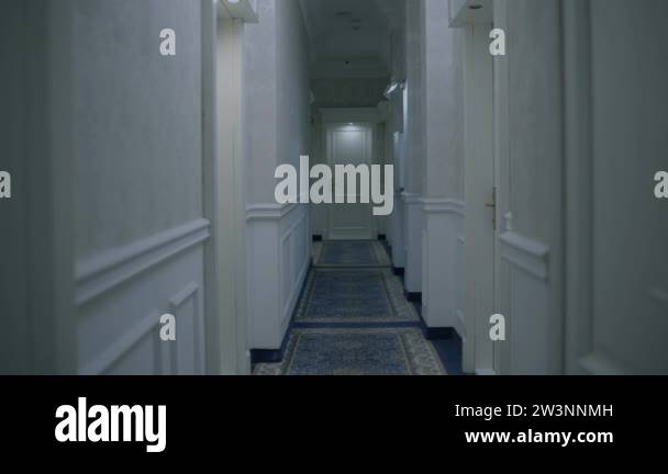 Spirit of widow appearing in mysterious hotel corridor, scary ghost of ...