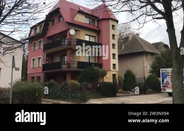 Ustka, Poland, A house that has a sign on the side of a building Stock ...