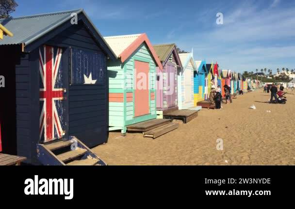 MELBOURNE - MAR 15 2019:Visitors at Victorian bathing boxes in Brighton ...