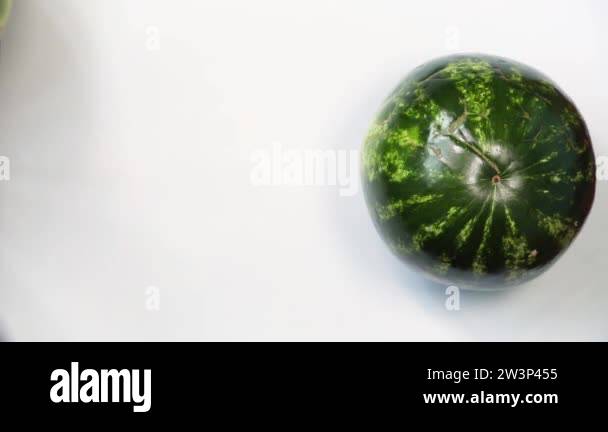 Watermelons spinning and coming to the frame Stock Video Footage - Alamy