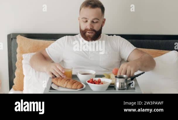 Sitting eating holding food and drink healthy eating Stock Videos ...