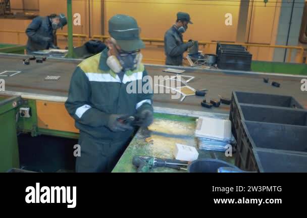 People work at a garbage plant, preparing trash for recycle. Recycle process, secondary use of ...