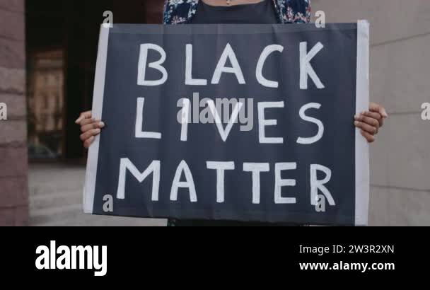 African american female hands holding carton placard with black lives ...