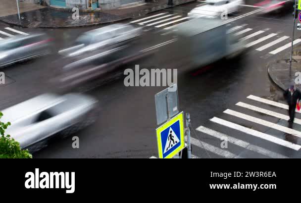Intensive Traffic on a City Street. Timeiapse. Shooting at long ...