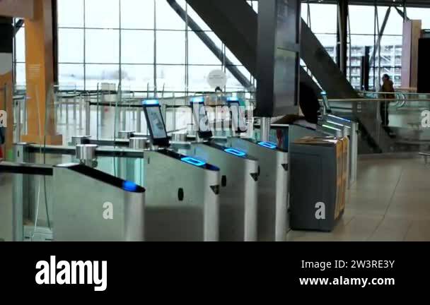 France, Lyon - Jan 11 2020, Lyon Saint Exupery Airport, people pass through electronic ...