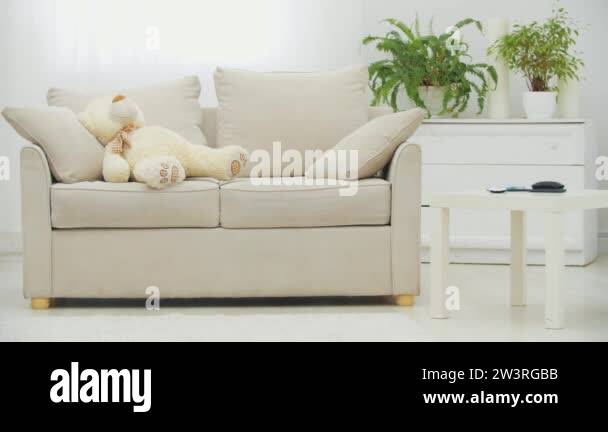 Sun is shining through the window, but sweet little girl coming, laying ...