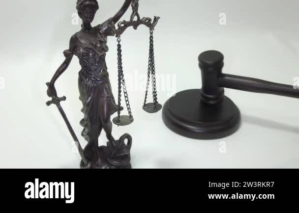 Statue of Themis - goddess of justice on white background. Themis is a ...