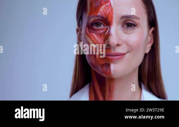 Botox injection in the face. Young woman with half of face with muscles ...