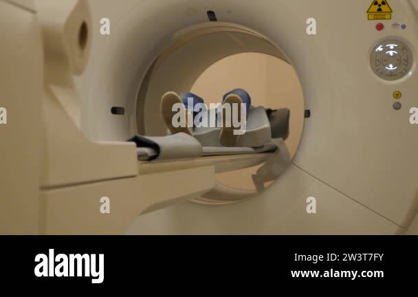 close-up footage of person in Magnetic resonance imaging (MRI) machine ...