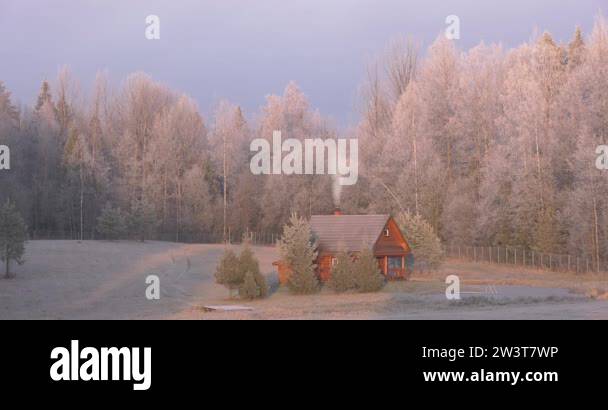 A house on the edge of the forest next to the freeze pond. Surrounded ...