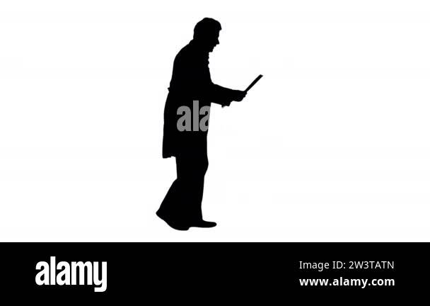 Silhouette Doctor in a rush viewing MRI scans while walking Stock Video ...