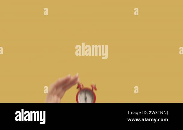 Hand alarm clock Stock Videos & Footage - HD and 4K Video Clips - Alamy