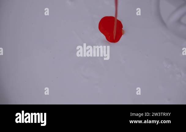 Mixing drips red pigment white Stock Videos & Footage - HD and 4K Video ...