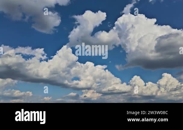 Motions clouds puffy fluffy white clouds sky time lapse slow moving clouds Stock Video Footage ...