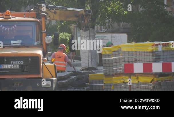 Workers in Workwear at Road Repair Lorry Excavator Behind Lorry Loading ...
