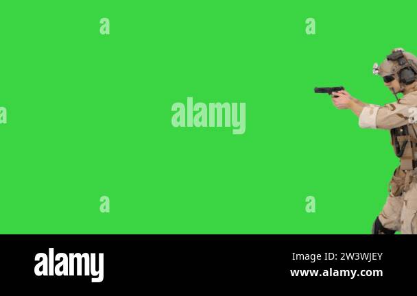 Soldier walking and aiming with a pistol on a Green Screen, Chroma Key ...