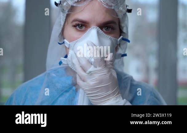 Portrait of woman doctor weaing protective suit during coronavirus ...