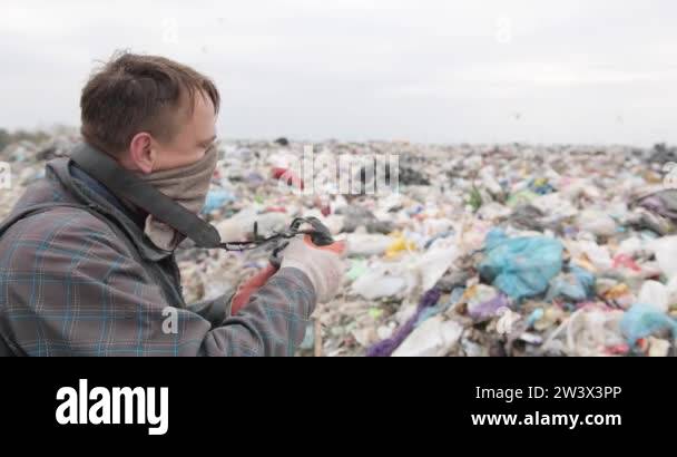Photographer make photo at the landfill. Mountain garbage, large and ...
