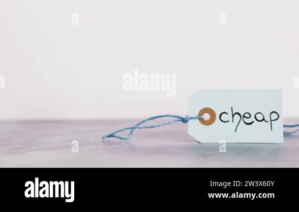 Cheap vs Costly prioduct price tags next to each other symbol of ...