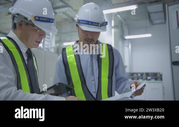Engineer concept of 4k Resolution. The employee is checking the ...