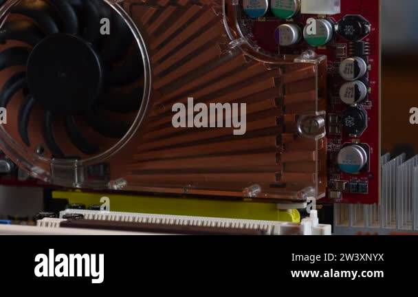 Detail of the Graphic Video Card dissipator inserted on a modern PC ...