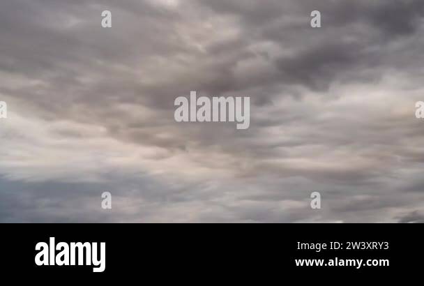 clouds are floating in the sky. skies are changing from day to night ...