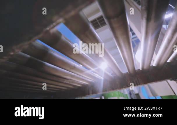 Barrel on the conveyor bottom view, the movement of the barrel on the ...