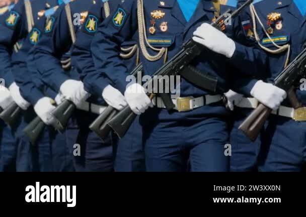 Parade military firearm rifle kalashnikov ak-47 in hand soldier close ...