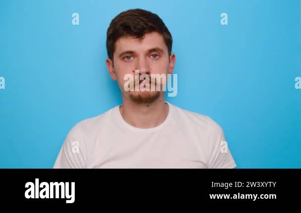 Exhausted young man feeling bored, lack of motivation, apathy, wears t ...