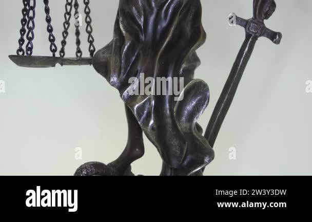 Statue of Themis - goddess of justice on white background. Themis is a ...