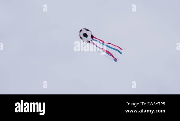 Kite in the Form of a Soccer Ball. An air kite painted under a soccer ...