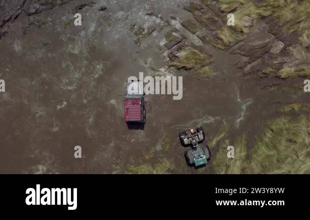 Festival of off-road lovers. SUVs drive the swamp. Cars skid in the mud ...