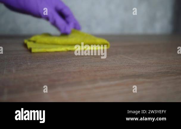 man wipes the table with a rag Stock Video Footage - Alamy