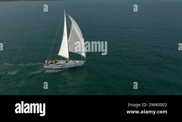 Aerial footage from drone, of professional speed yacht or sailboat ...
