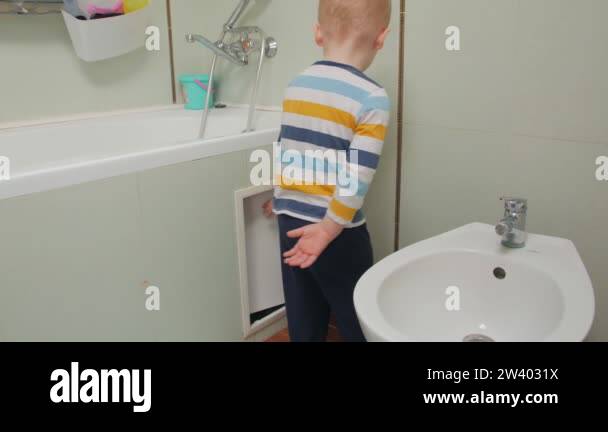 Boy in the toilet Stock Videos & Footage - HD and 4K Video Clips - Alamy